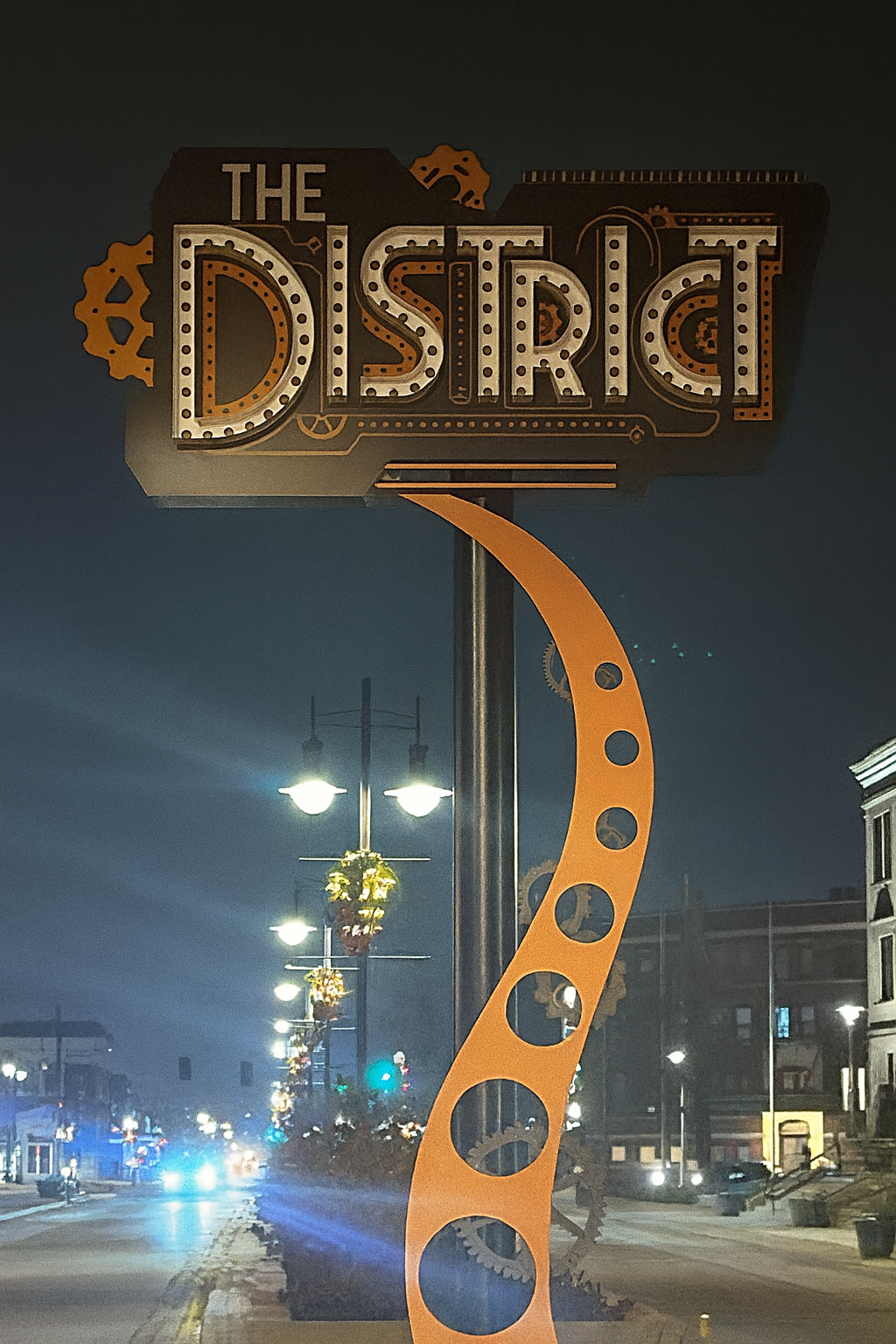 A New Sign and Old-Fashioned Magic in The District – granitecitygossip.com